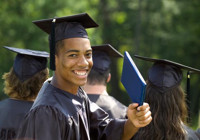 Smiling Graduate with Diploma – FormsFly Support